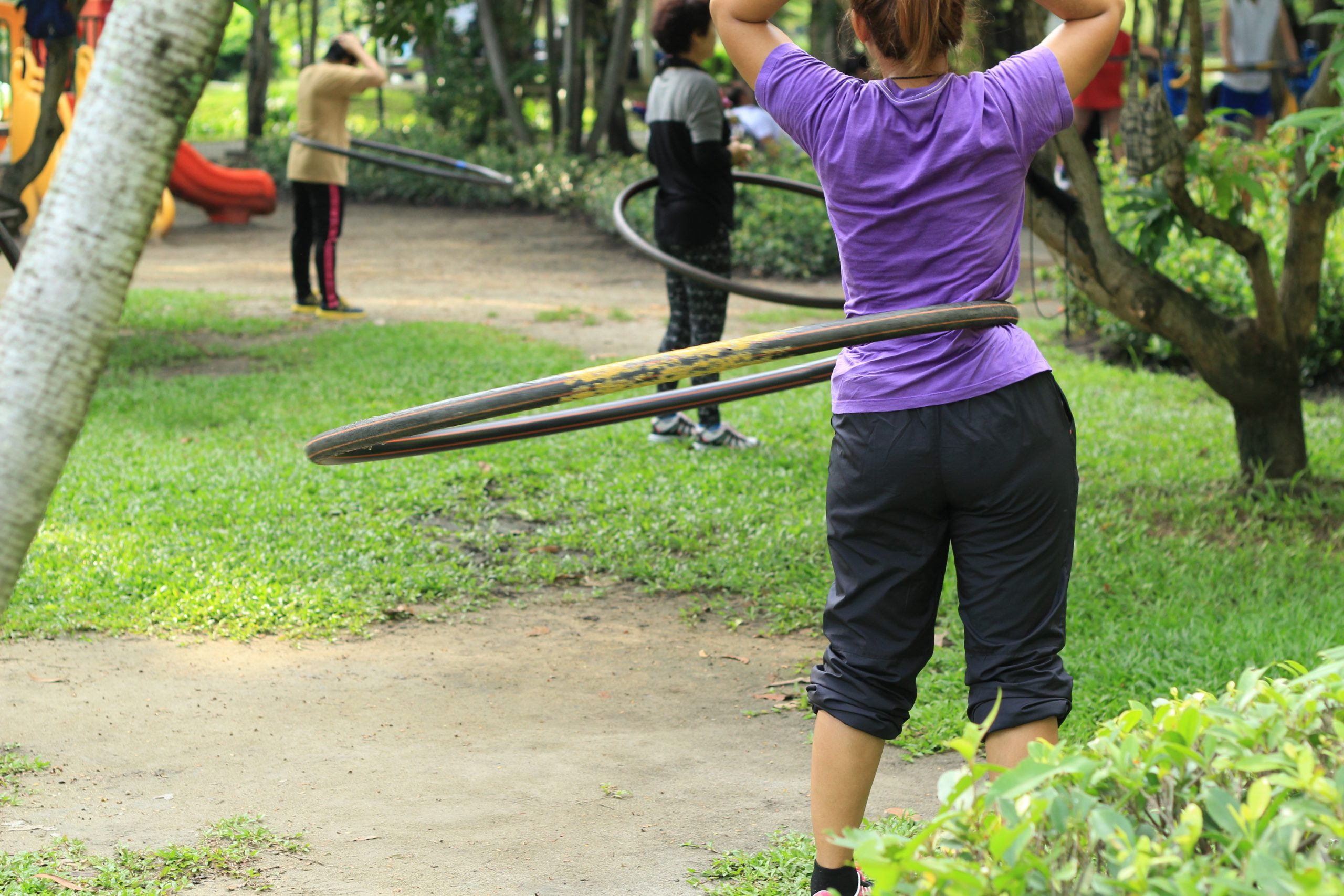 Beautiful,Young,Woman,With,Hula,Hoop,In,The,Park – Priapus Shot